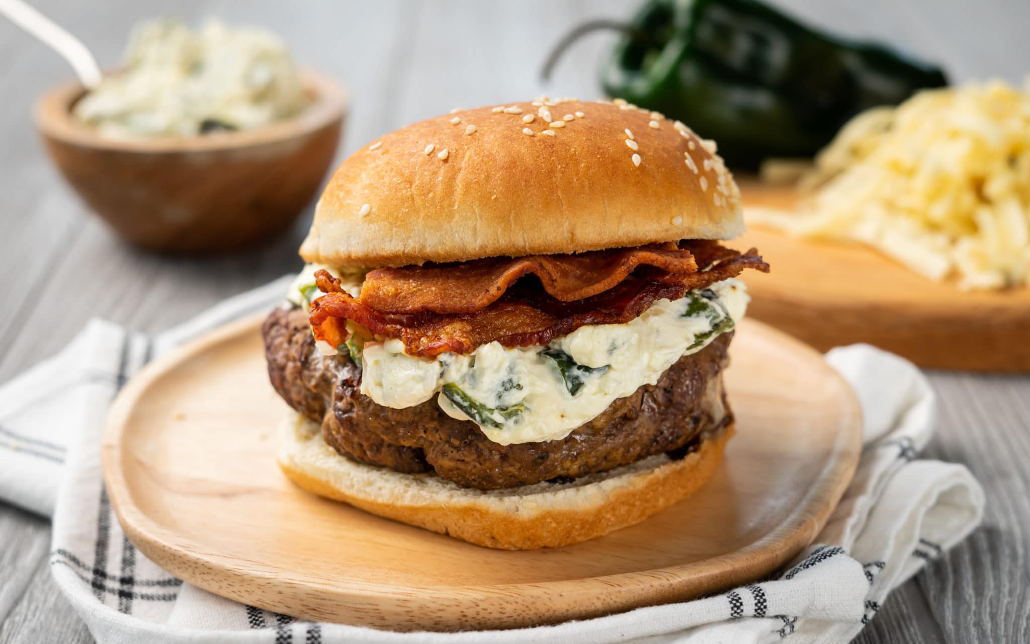 Pepper Jack Stuffed Burgers with Poblano Cream Sauce | Savor Recipes